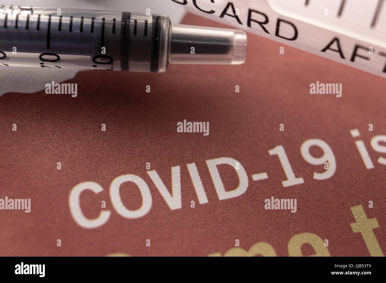 Closeup COVID-19 keyword printed on a letter envelop with the medical ...