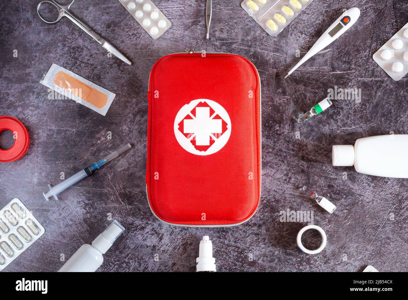Home first aid kit, pills, thermometer on plain background Stock Photo ...