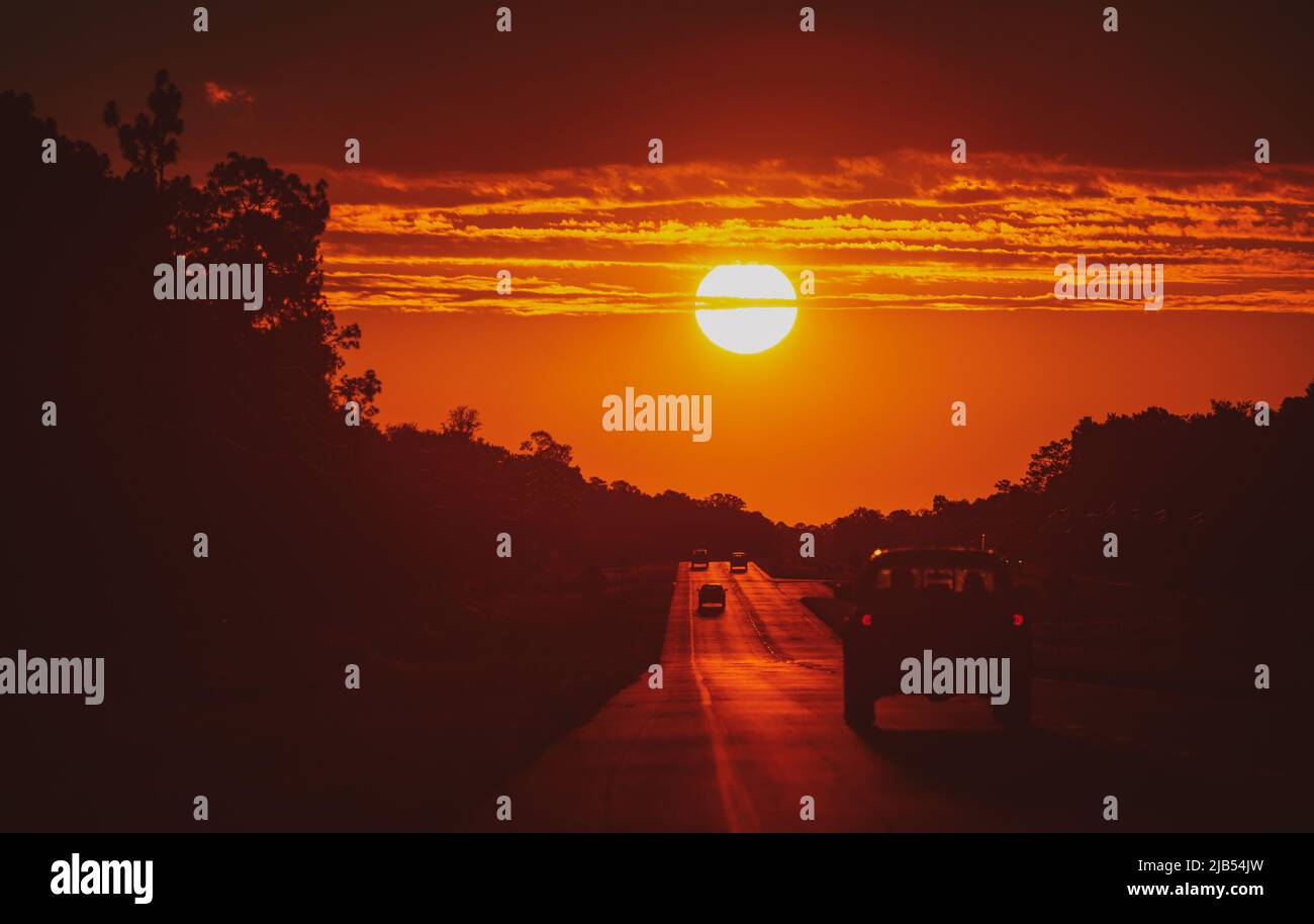 Sunset highway. Dramatic sun. Freeway roadtrip journey, scenery ...