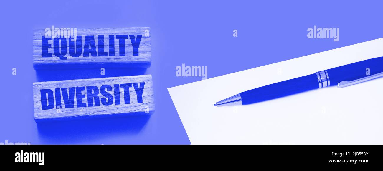 Equality diversity words written on wood blocks. ETolerance inclusion ...