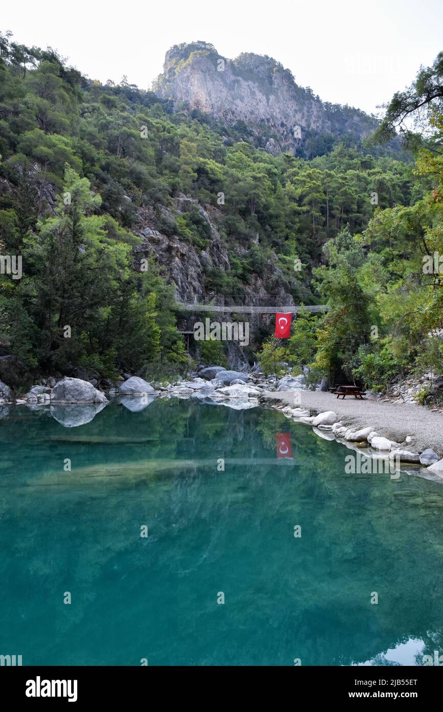 Lakes in the Goynyuk canyon. Blue lake and above it the flag of Turkey ...