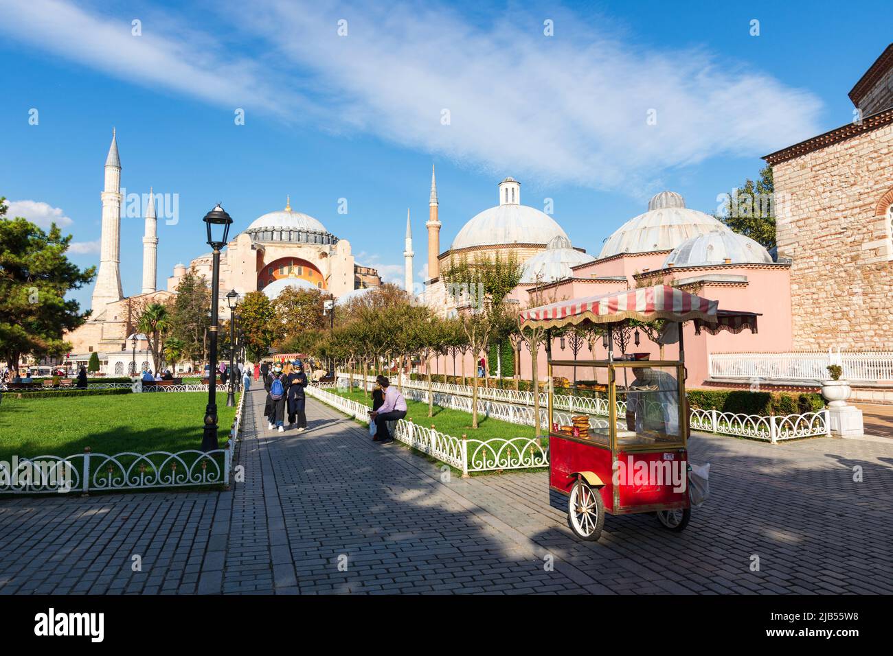 The central square of Istanbul. Palm trees and a crowd of tourists ...