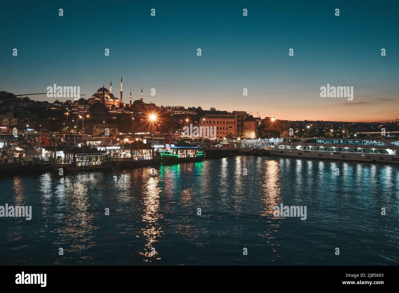 Night view on the restaurants at the end of the Galata bridge ...
