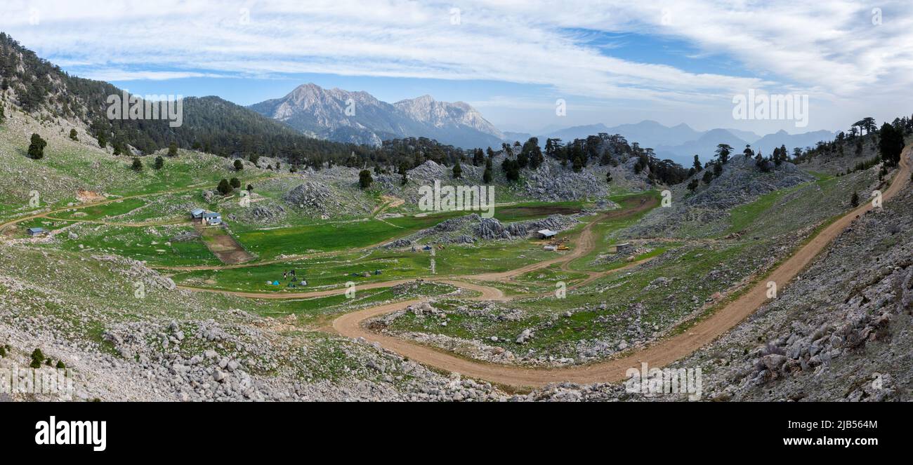 Alpine farm on Chukur Yayli. A huge valley in the mountains is ...