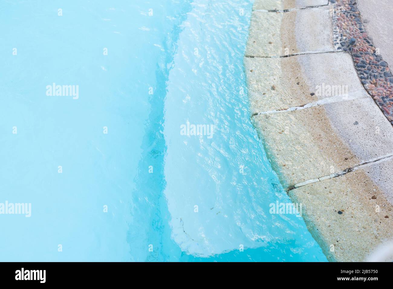 surface of blue swimming pool, background of water in swimming pool ...
