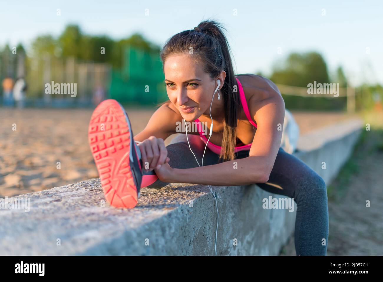 Athletic Woman Stretching Her Hamstring Legs Exercise Training Fitness