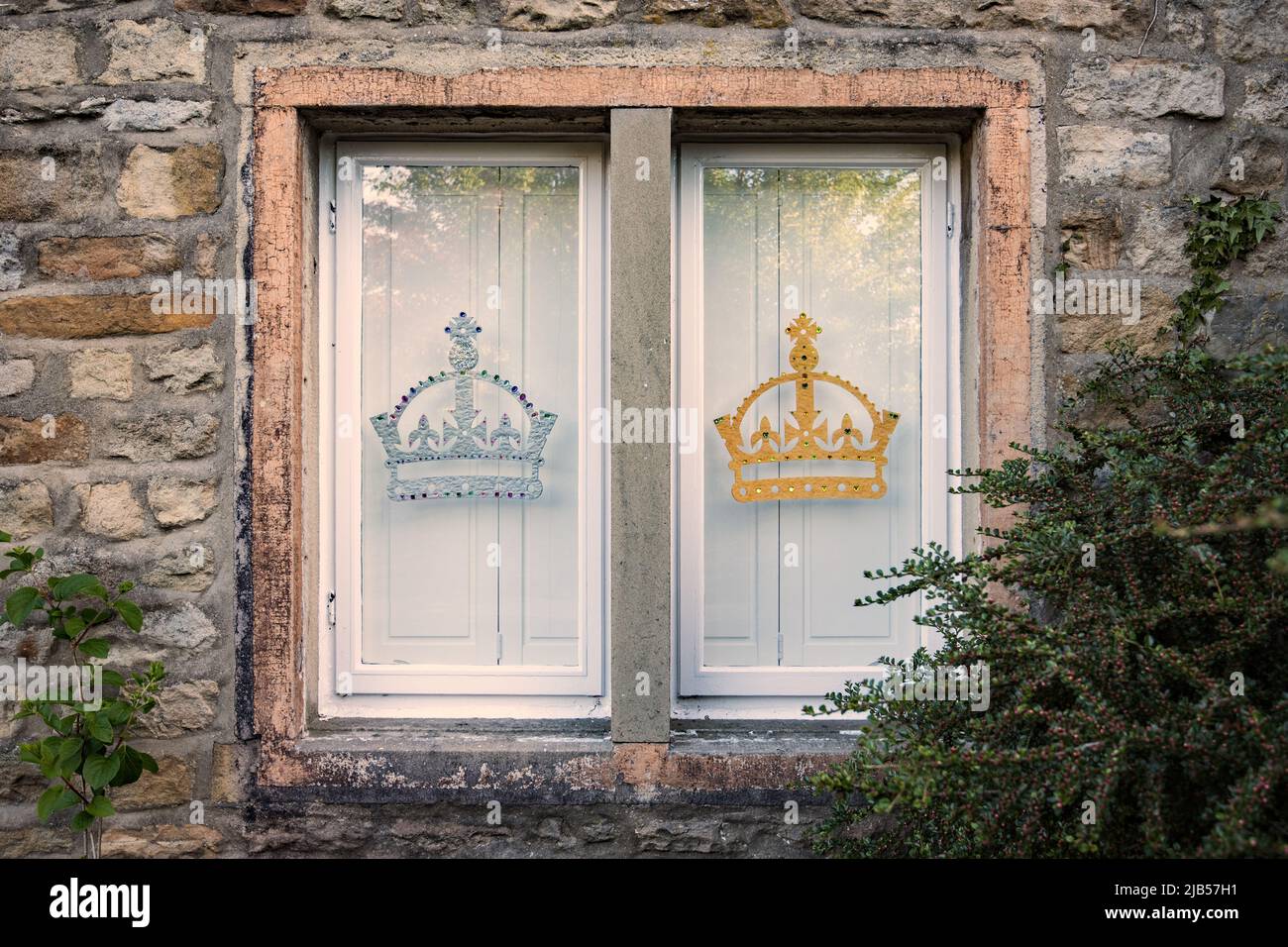 Decorative crowns on a window in School Lane, Long Preston marking the ...