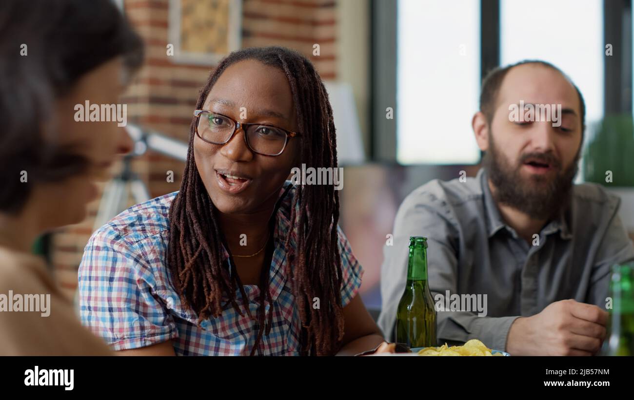 Competitive friends playing tactics cards game together, using strategy ...