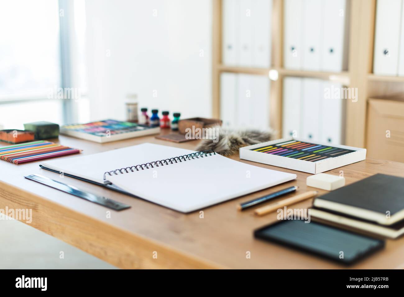 Painter workplace in order side view. Designer desk with drawing ...