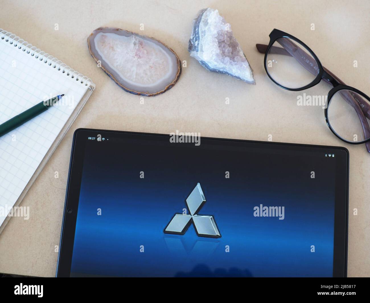 In this photo illustration Mitsubishi Group logo seen displayed on a ...