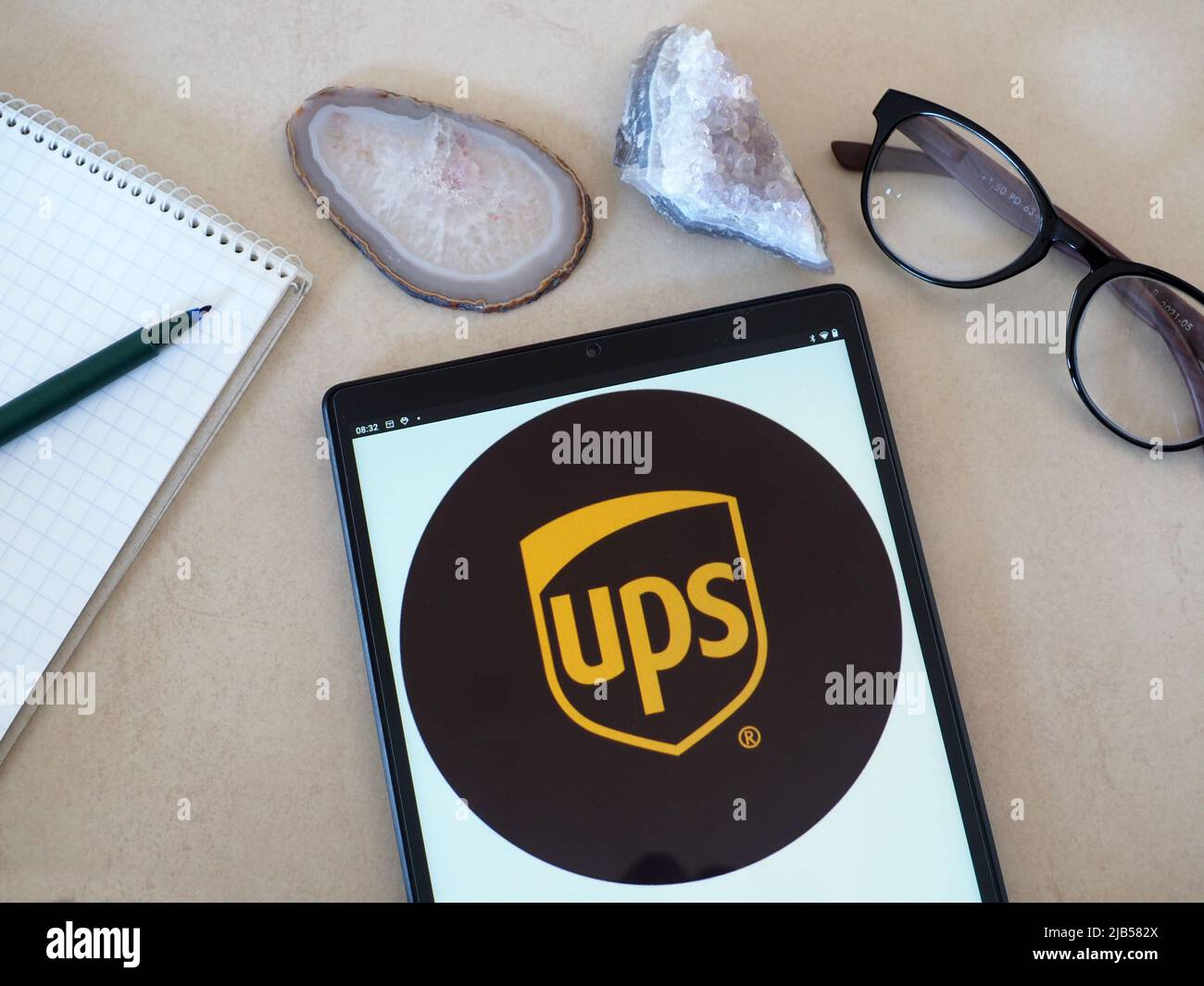 In this photo illustration UPS (United Parcel Service) logo seen ...