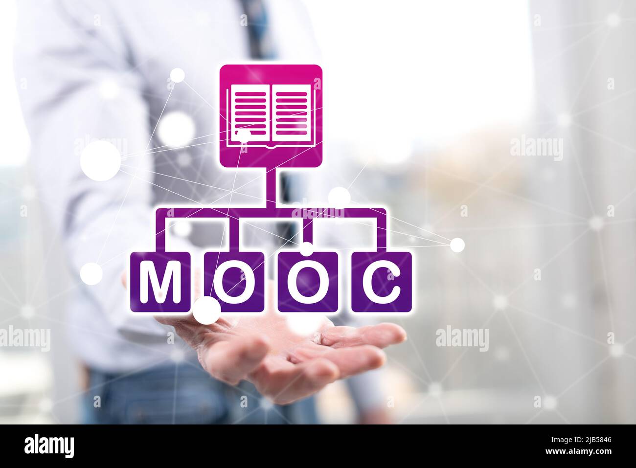 Mooc concept above the hand of a man in background Stock Photo - Alamy