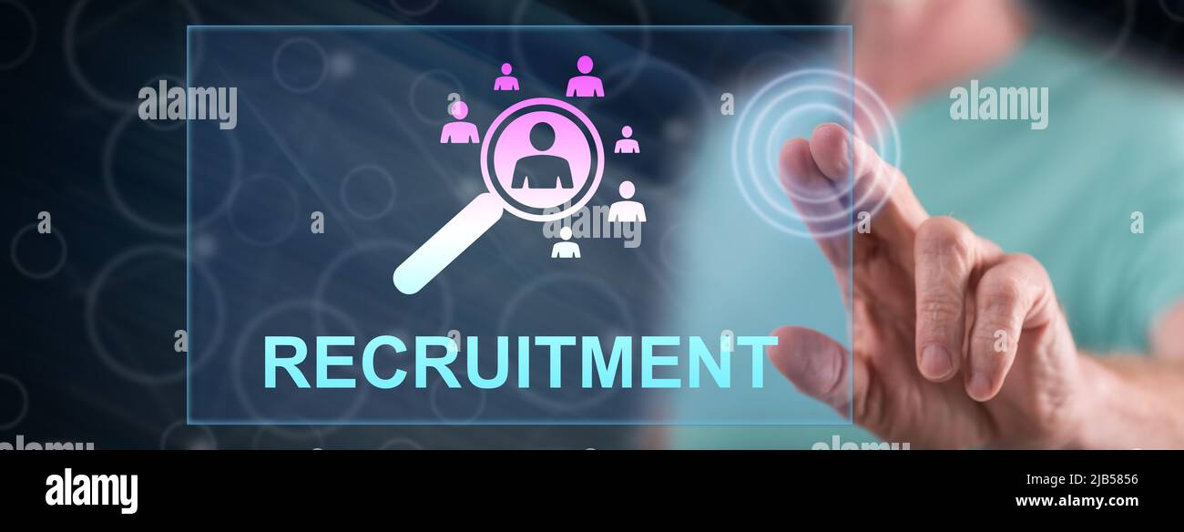 Man touching a recruitment concept on a touch screen with his finger ...