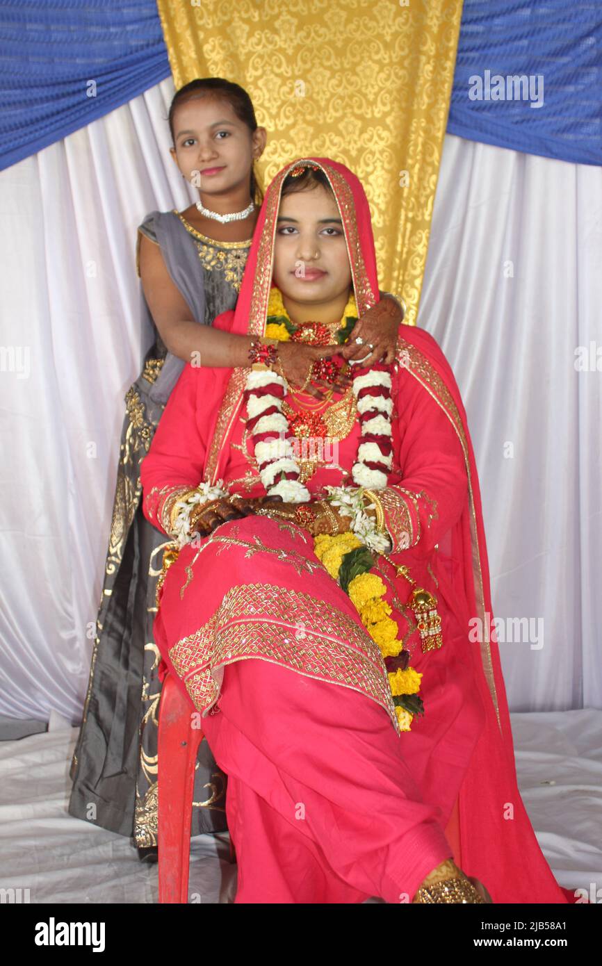 Portrait of adorable smiling Pakistani Muslim girl in traditional suit ...