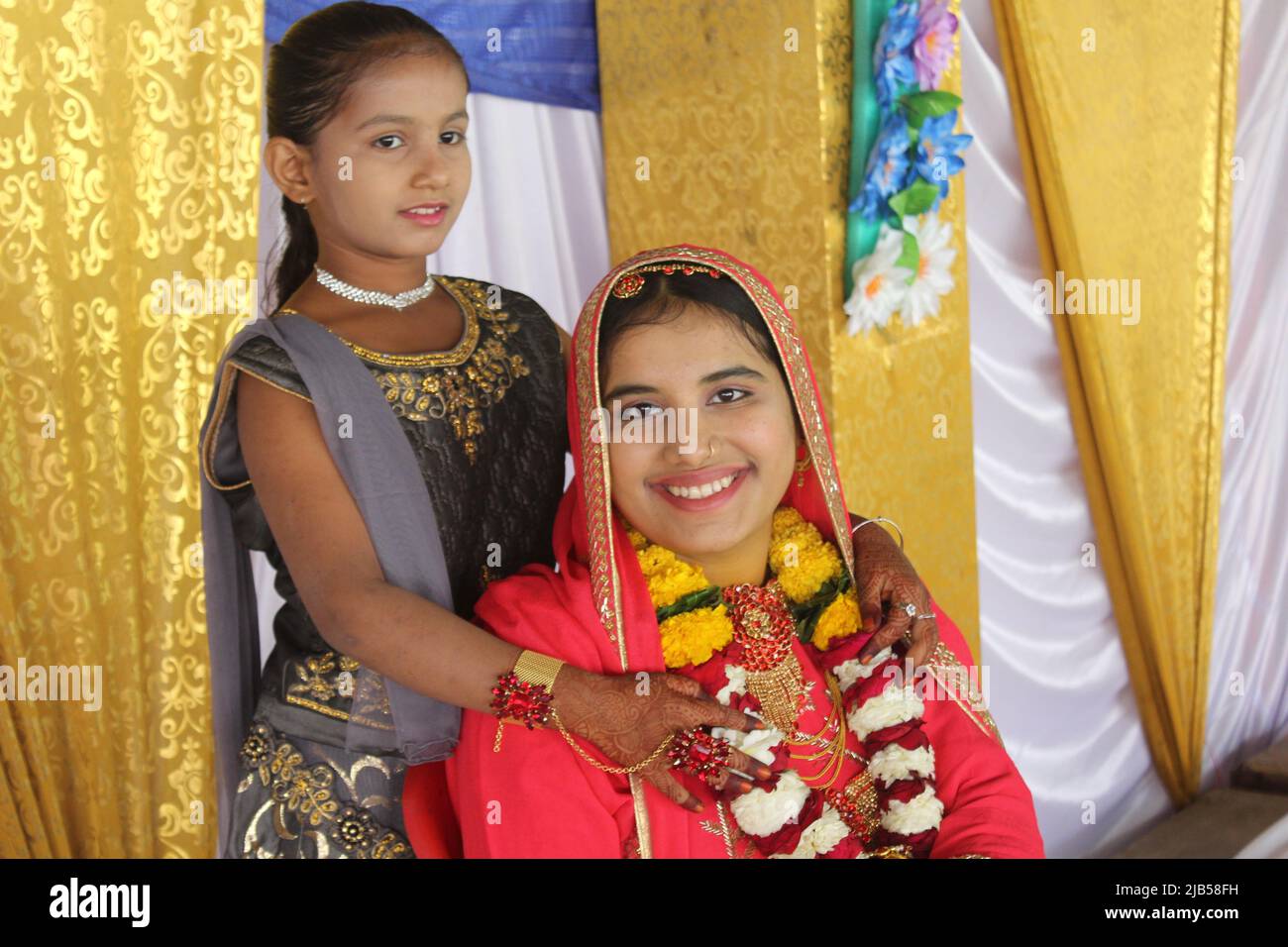 Portrait of adorable smiling Pakistani Muslim girl in traditional suit ...