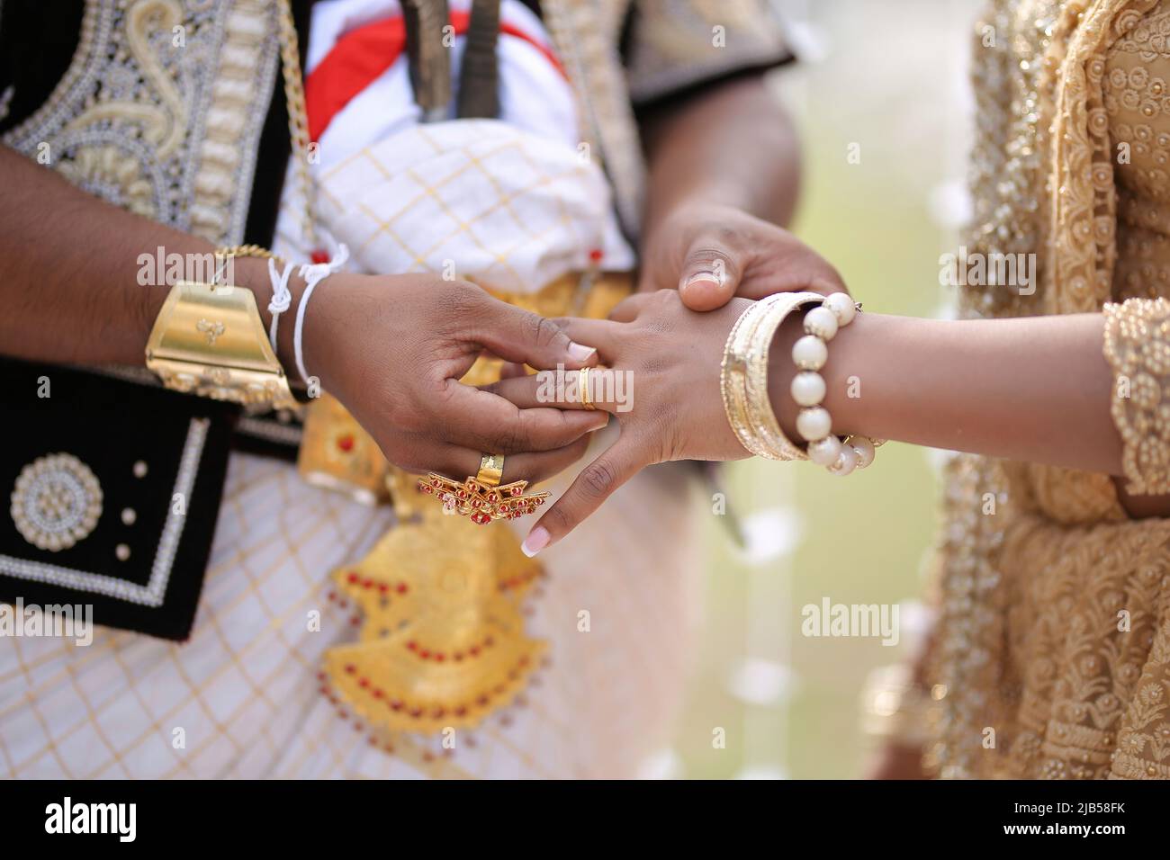 Wedding Rings Change Bride & Groom Stock Photo - Alamy