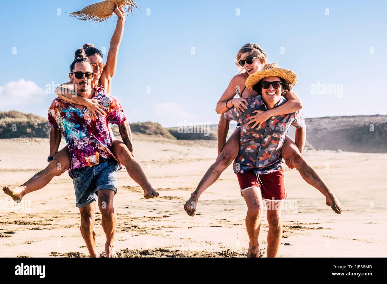 Happy young couple laughing hi-res stock photography and images - Alamy