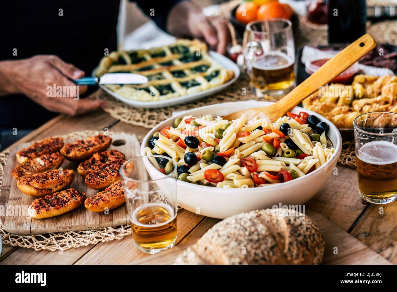 Table of people eating hi-res stock photography and images - Alamy