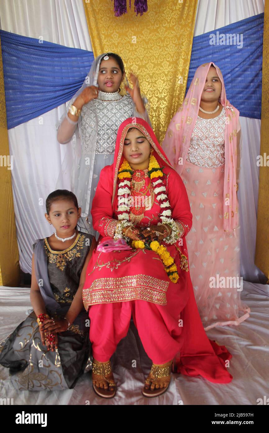 Portrait of adorable smiling Pakistani Muslim girl in traditional suit ...