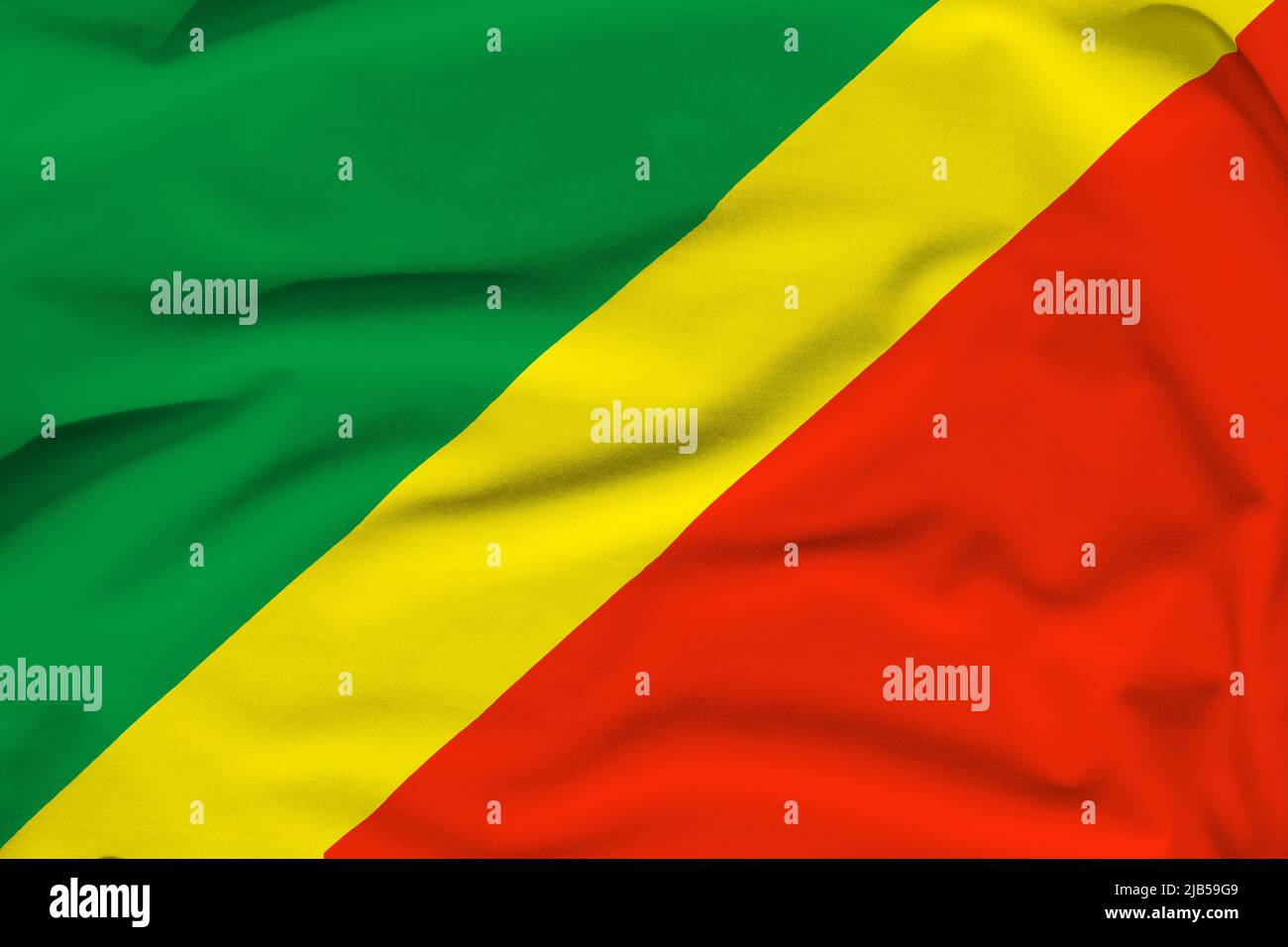 Republic of the Congo national flag, folds and hard shadows on the ...