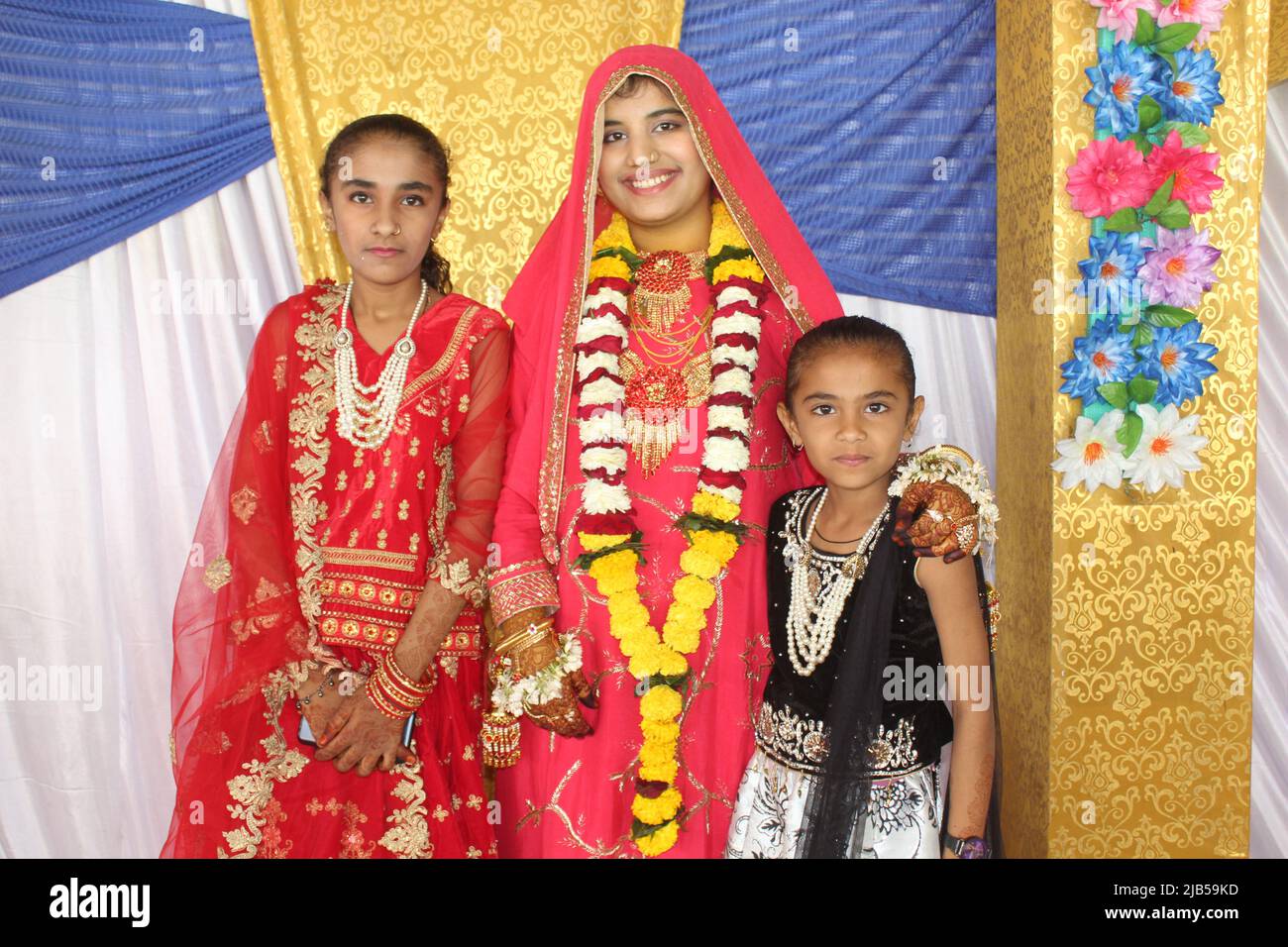 Portrait of adorable smiling Pakistani Muslim girl in traditional suit ...