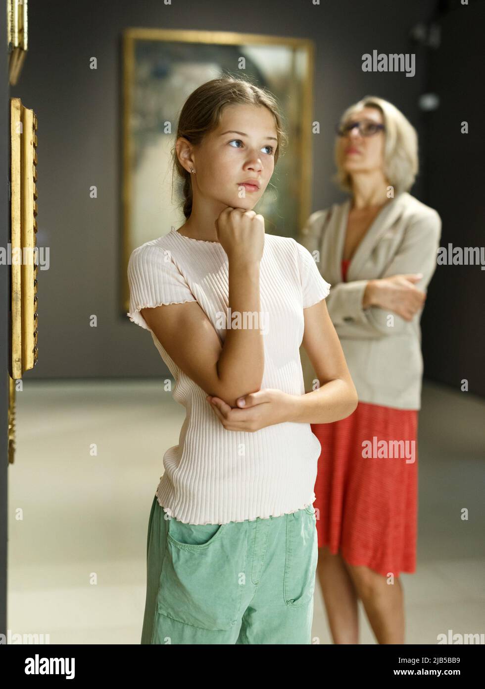 Teenage girl visiting museum Stock Photo - Alamy