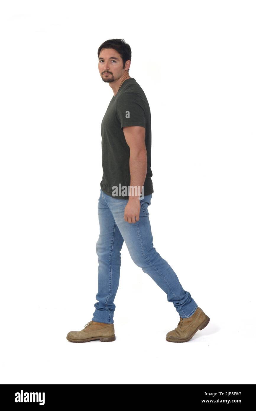 side view man walking and looking at camera on white background Stock ...
