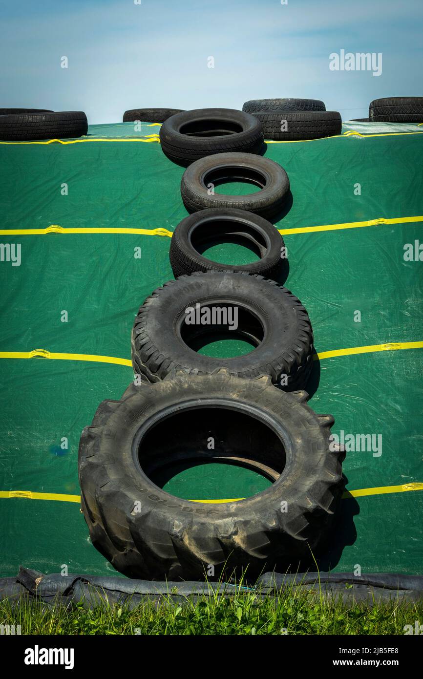 Old rubber tyres on a silage heap hi-res stock photography and images ...
