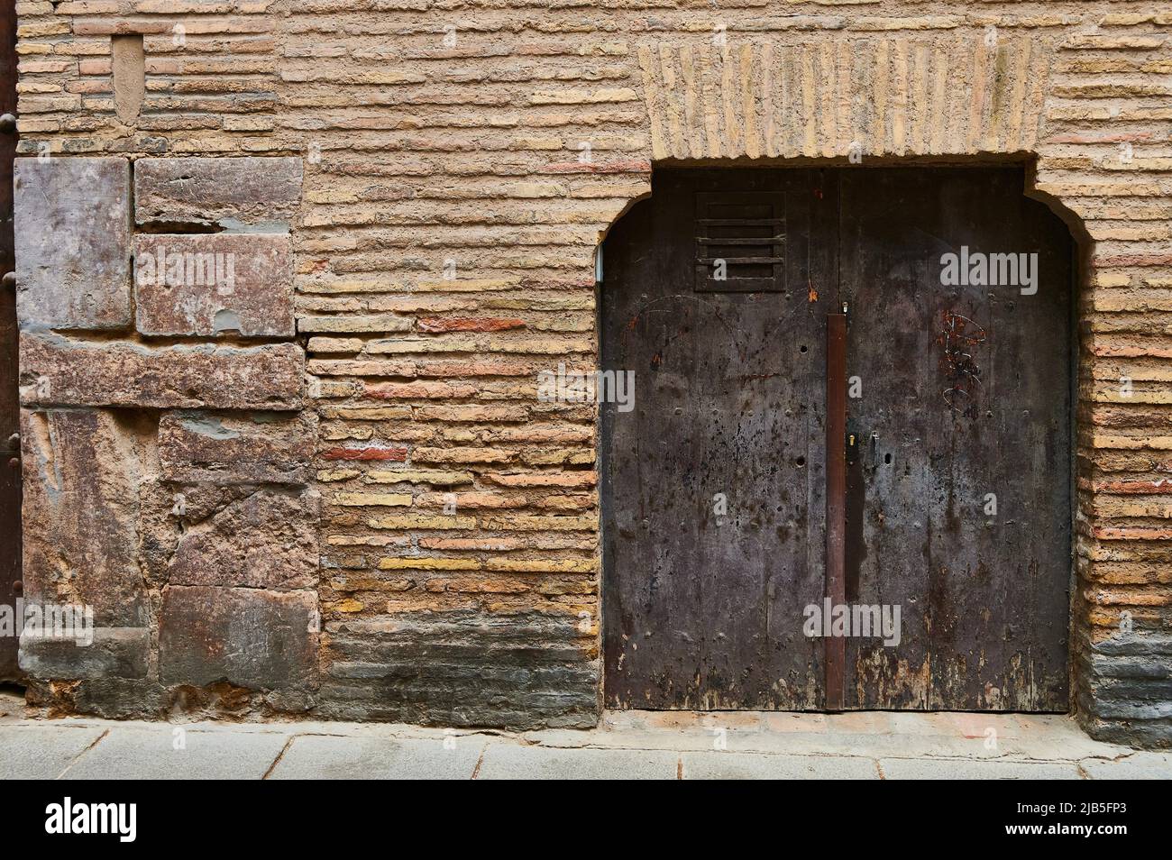 Detail of wooden ancient door with old iron rivets Stock Photo - Alamy