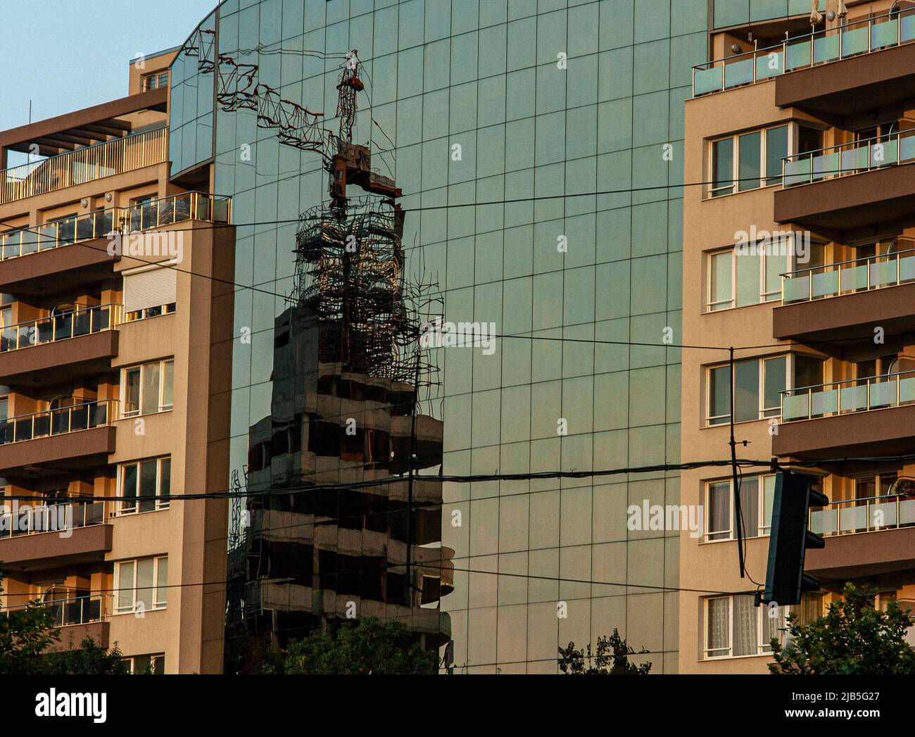Steel and glass architecture, reflection of a building under ...