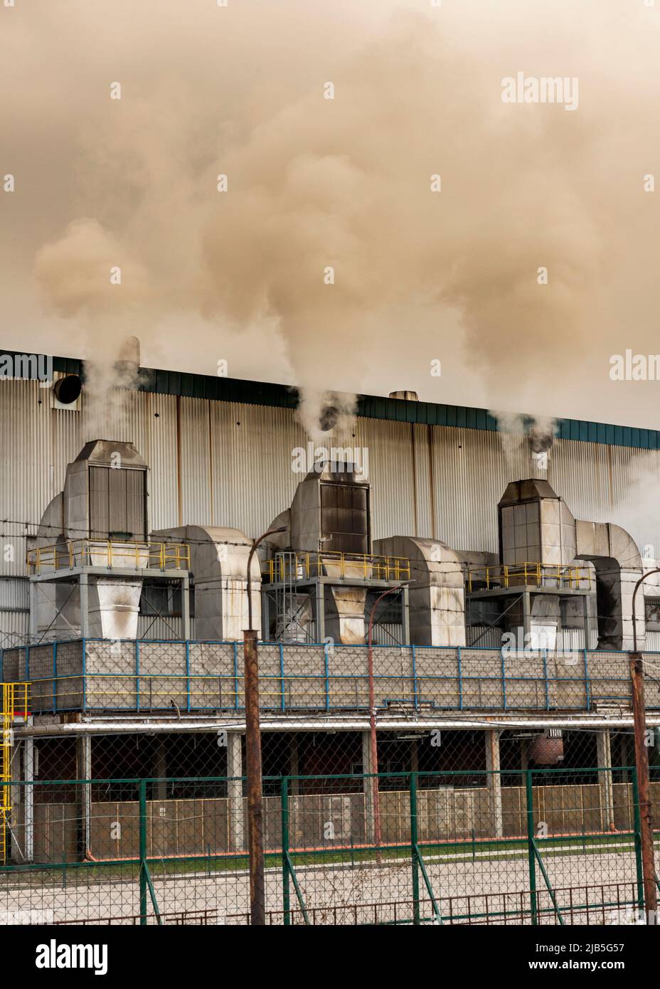Air pollution from power plant chimneys. Deadly smoke emmiting from the ...