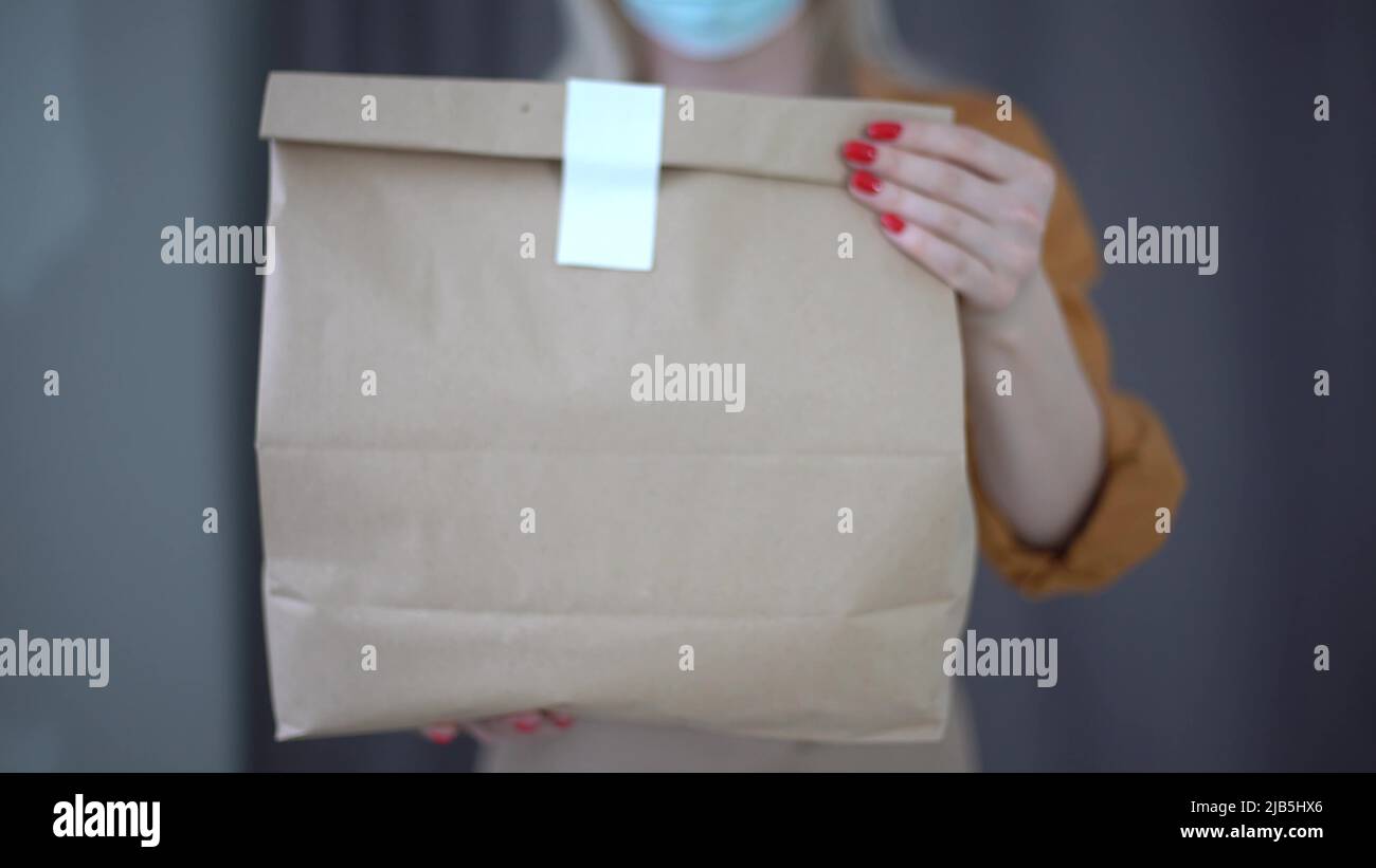 Woman giving fast food order isolated on white background. Female ...
