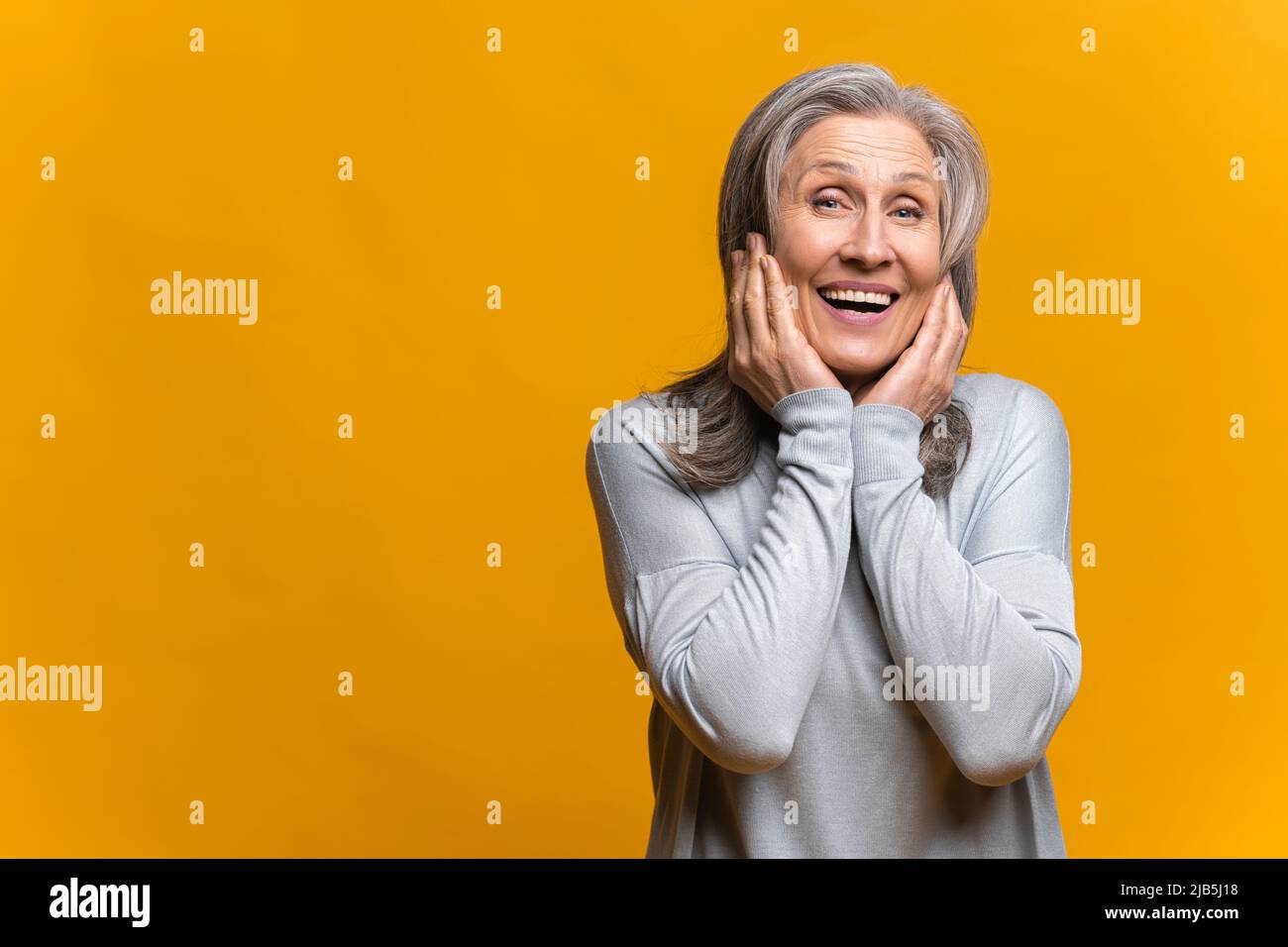 Happy female showing positive emotions hi-res stock photography and ...