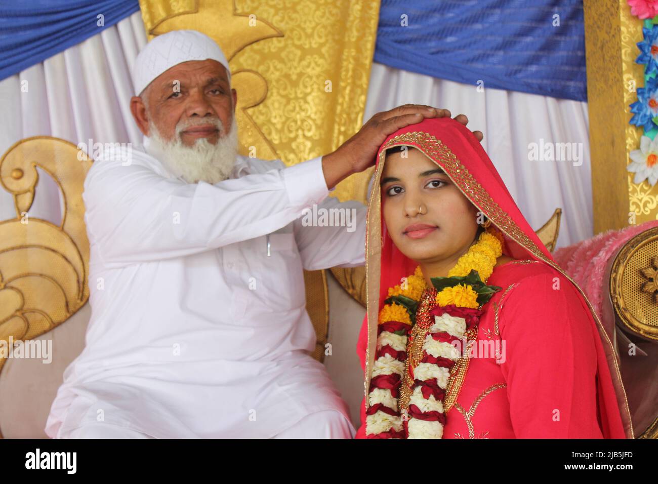 Portrait of adorable smiling Pakistani Muslim girl in traditional suit ...