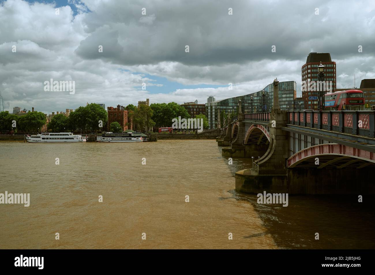View over brown coloured / colored River Thames London and Lambeth ...