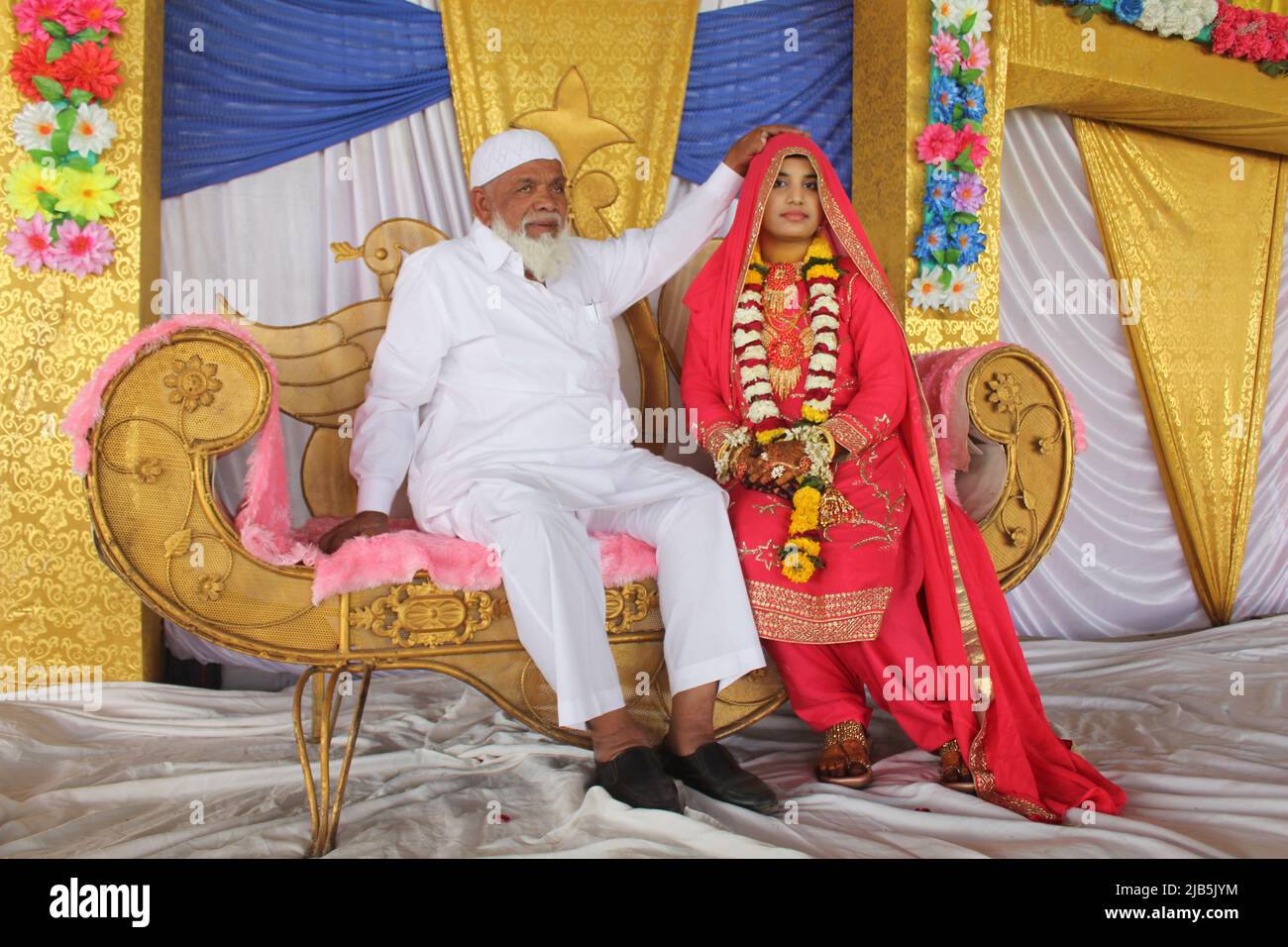 Portrait of adorable smiling Pakistani Muslim girl in traditional suit ...