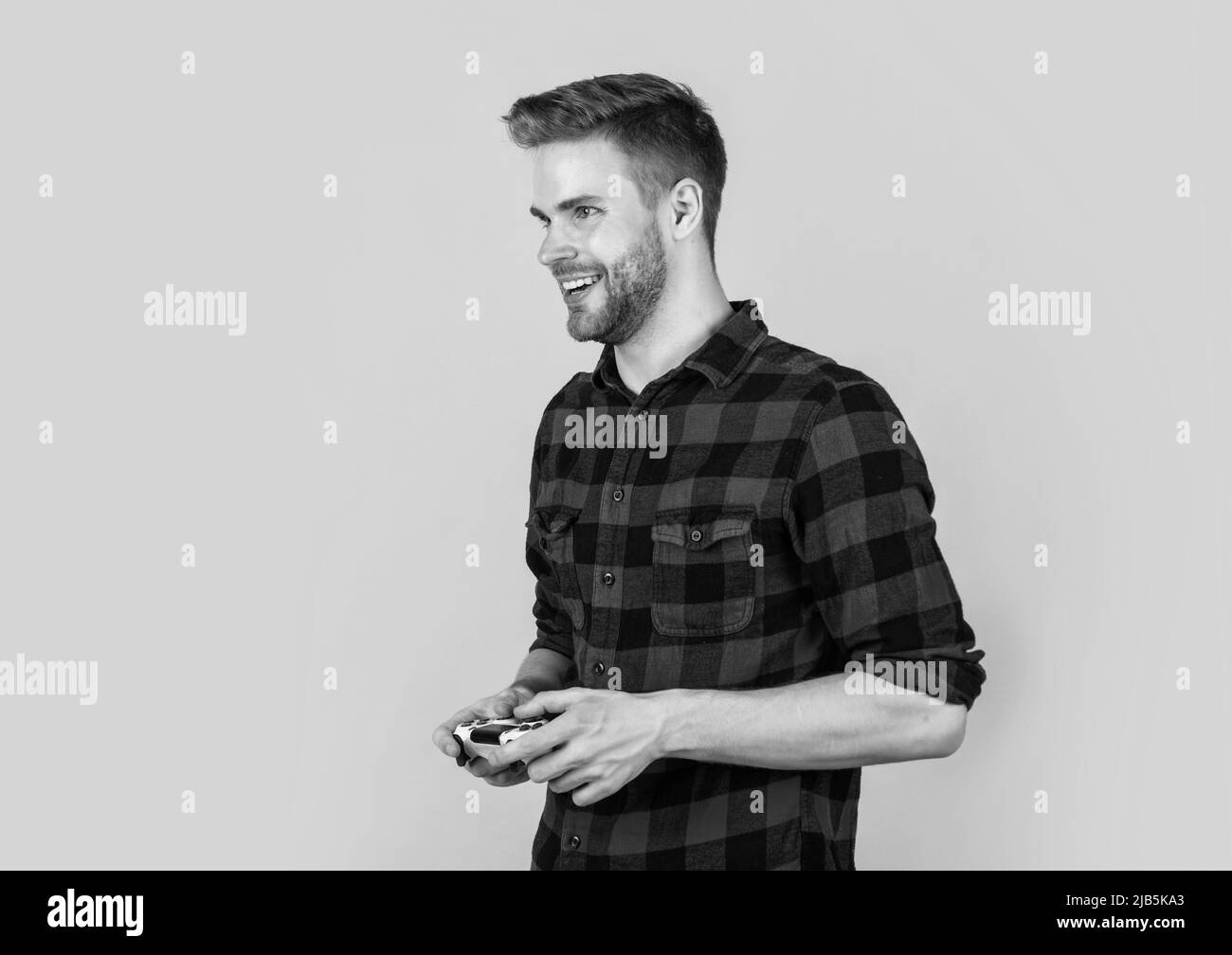 living in digital world. male hobby and free time. gamer in checkered ...