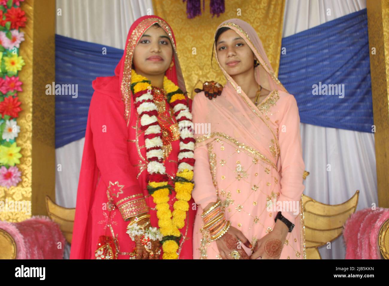 Portrait of adorable smiling Pakistani Muslim girl in traditional suit ...