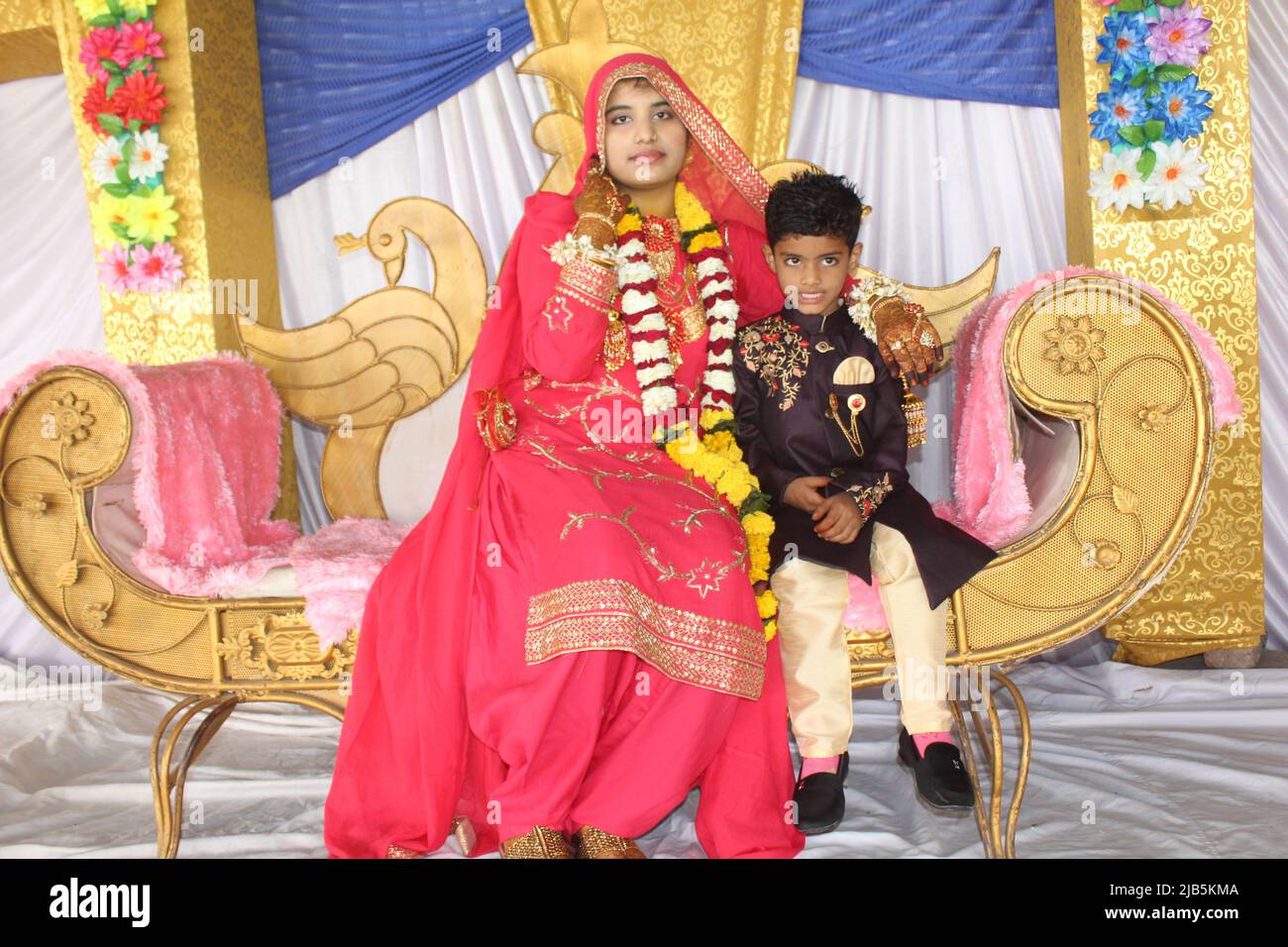 Portrait of adorable smiling Pakistani Muslim girl in traditional suit ...