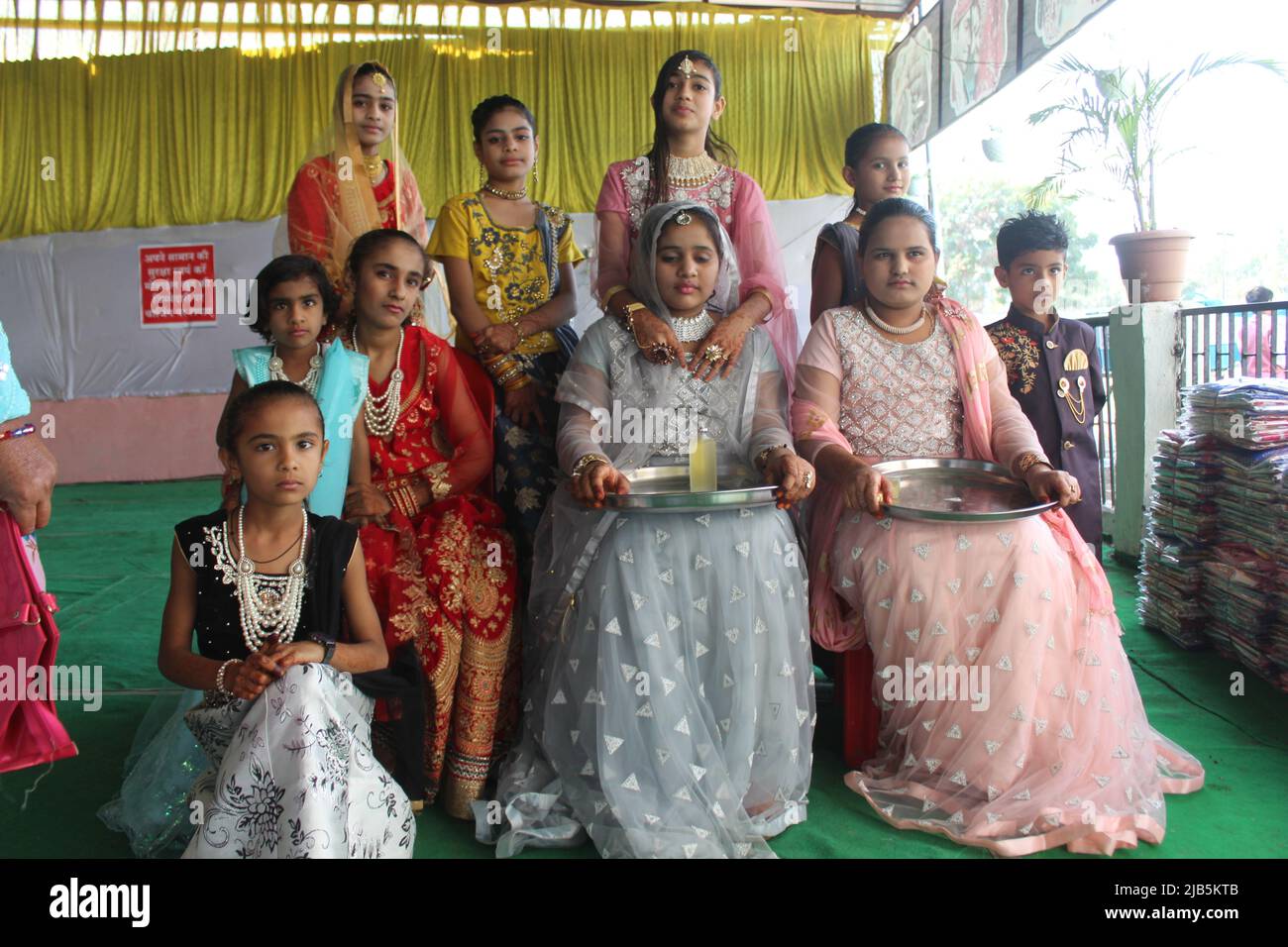 Portrait of adorable smiling Pakistani Muslim girl in traditional suit ...