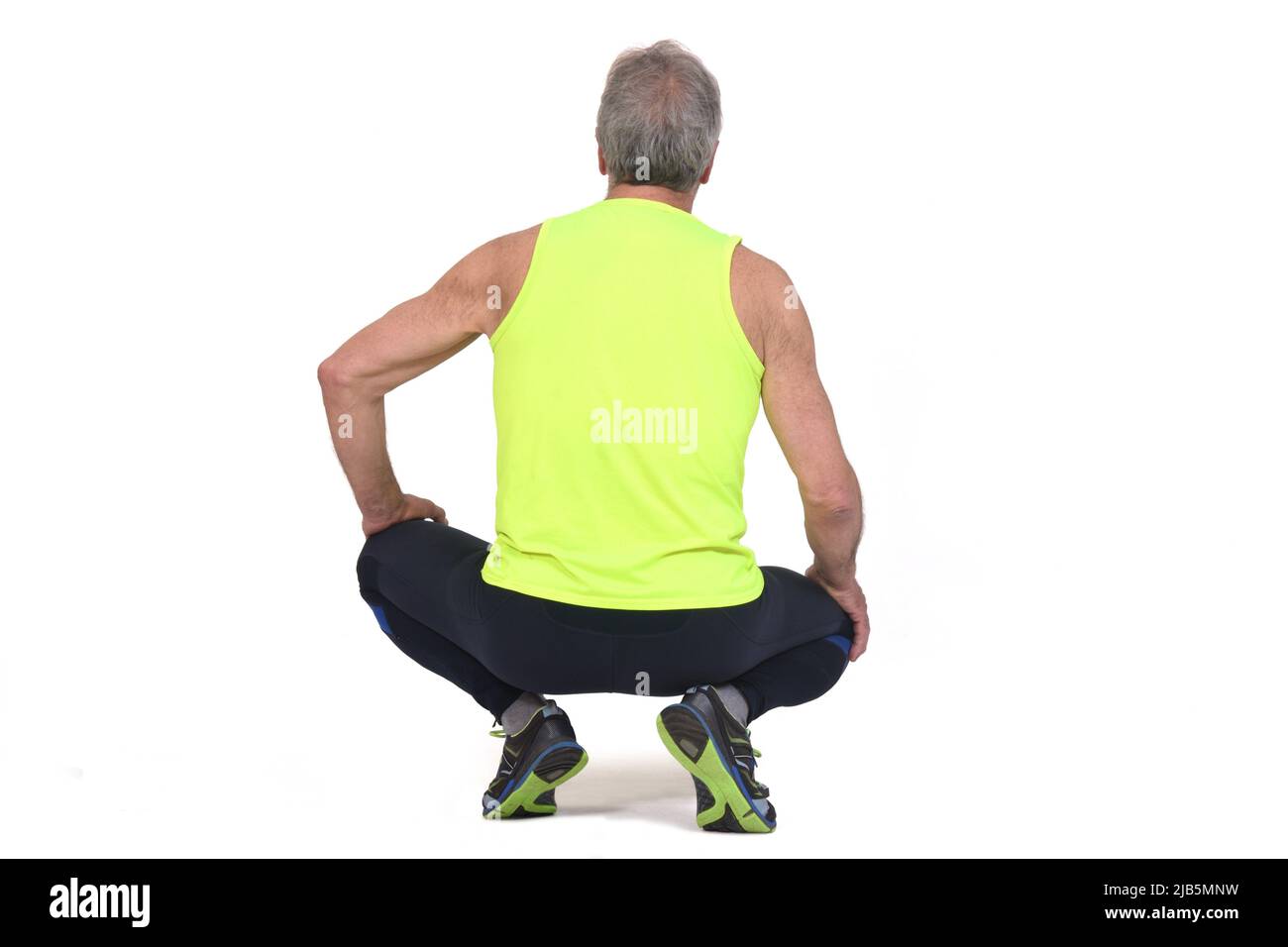 Man crouched rear view Cut Out Stock Images & Pictures - Alamy