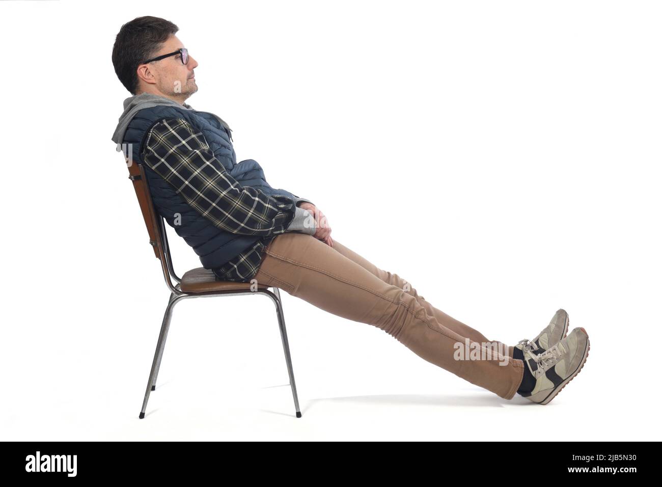 Portrait man lying on chair hi-res stock photography and images - Alamy