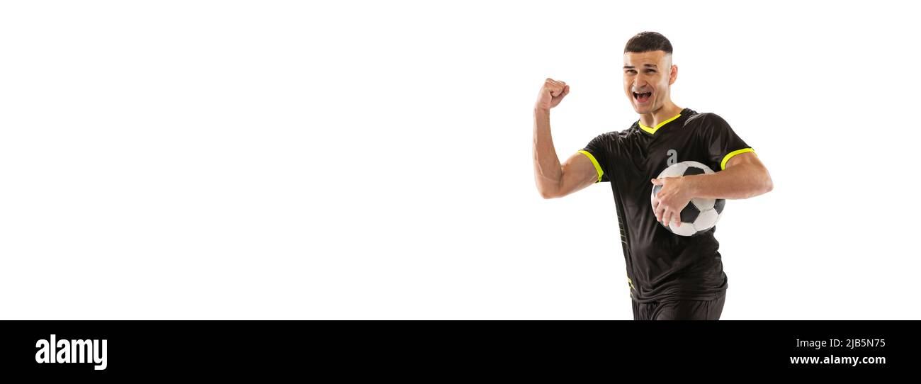 Win, success. Professional male soccer player in black football kit ...