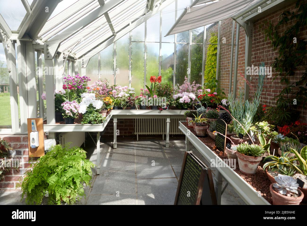 Greenhouse showing thermal screens for light shading and heat ...