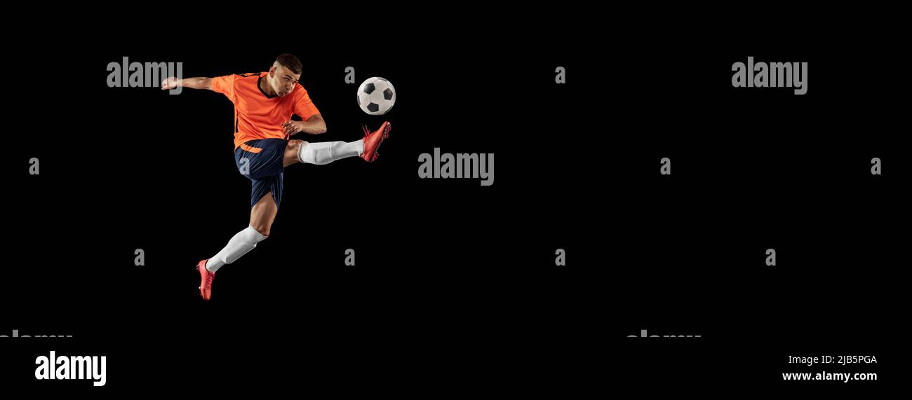Flyer. Dynamic portrait of professional male football soccer player in ...