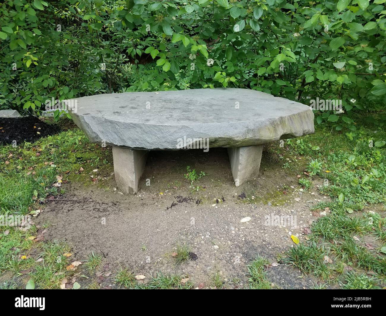 Grey bench hi-res stock photography and images - Alamy