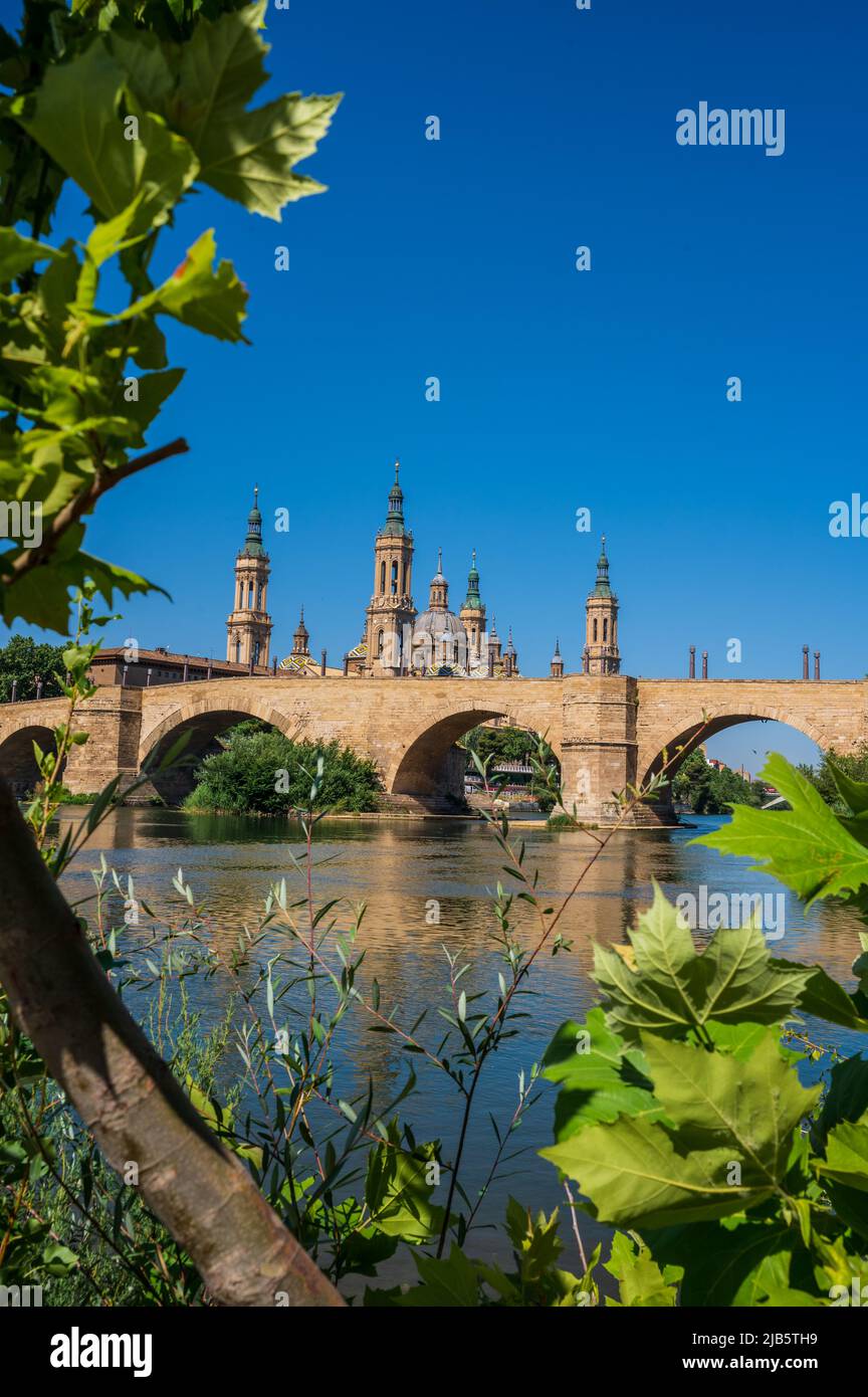 Stone Bridge (Puente de Piedra) and Cathedral-Basilica of Our Lady of ...