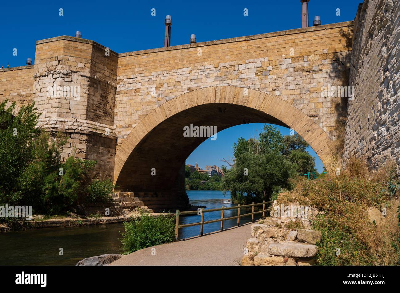 Stone bridge over the Ebro River in Zaragoza, Aragon, Spain Stock Photo ...