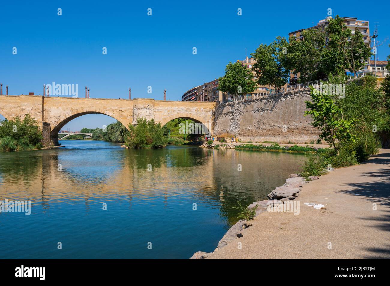 Stone bridge over the Ebro River in Zaragoza, Aragon, Spain Stock Photo ...