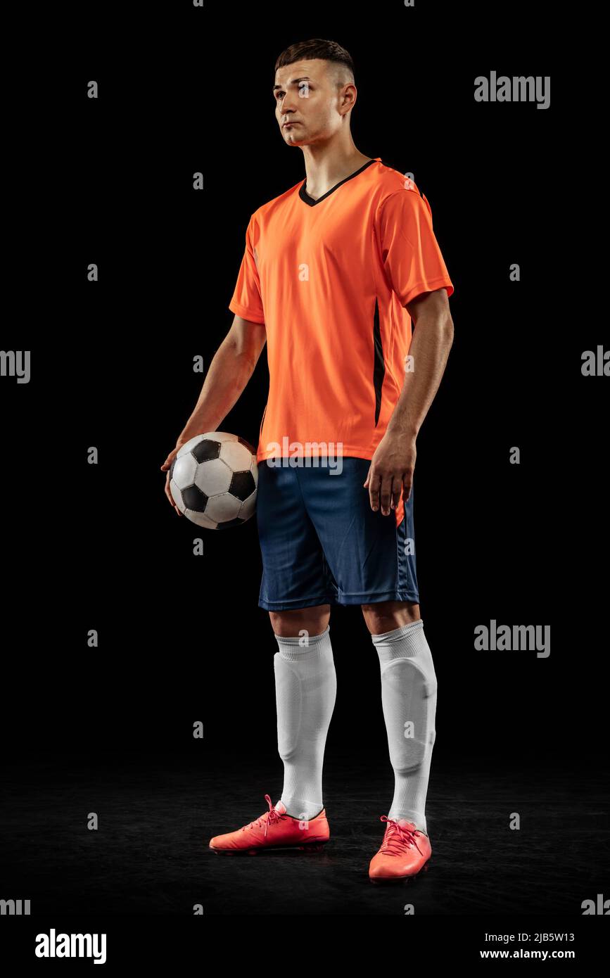 Orange and black football kit hi-res stock photography and images - Alamy